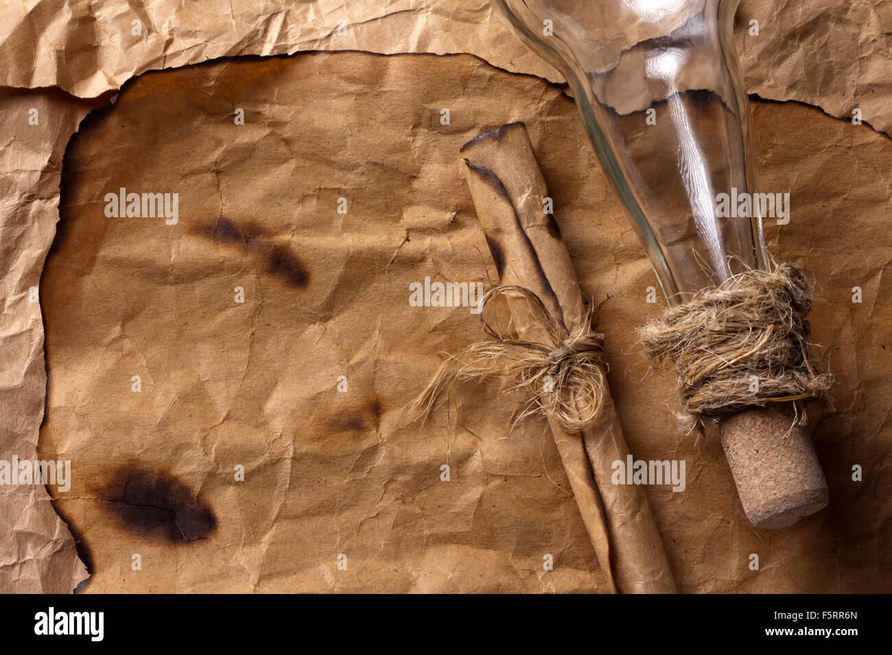 Background of old paper with message and bottle Stock Photo - Alamy