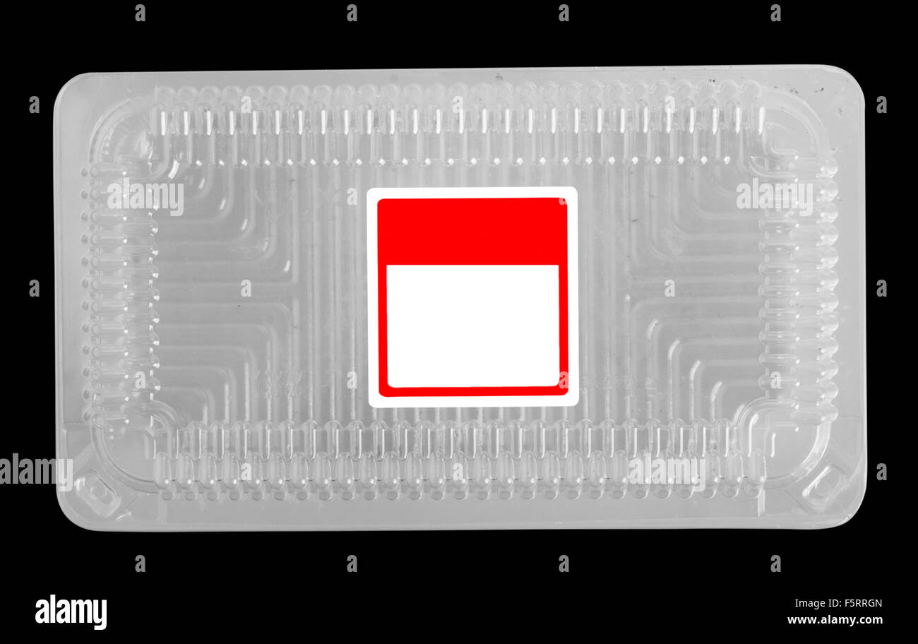 Empty plastic food tray with blank label. Isolated on black Stock Photo ...