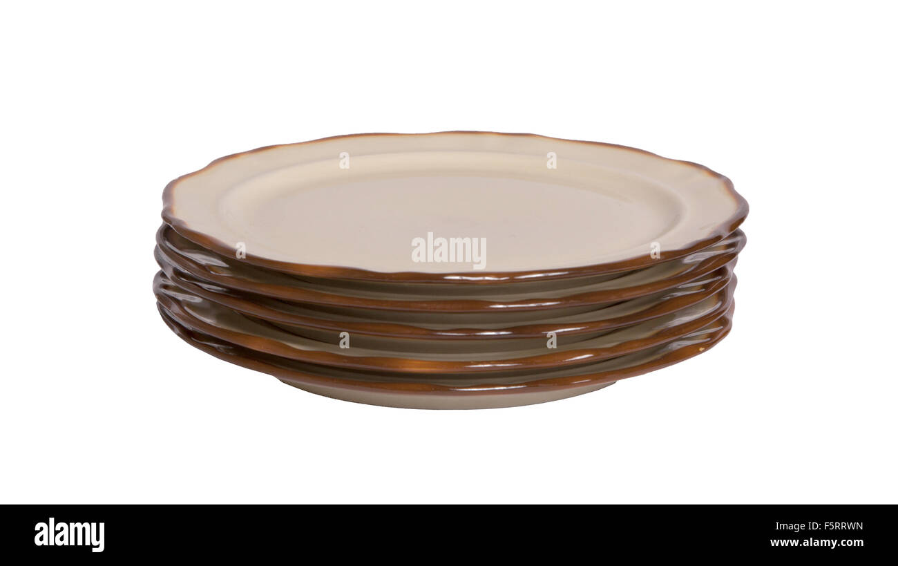 Vintage empty plates on a white background Stock Photo - Alamy