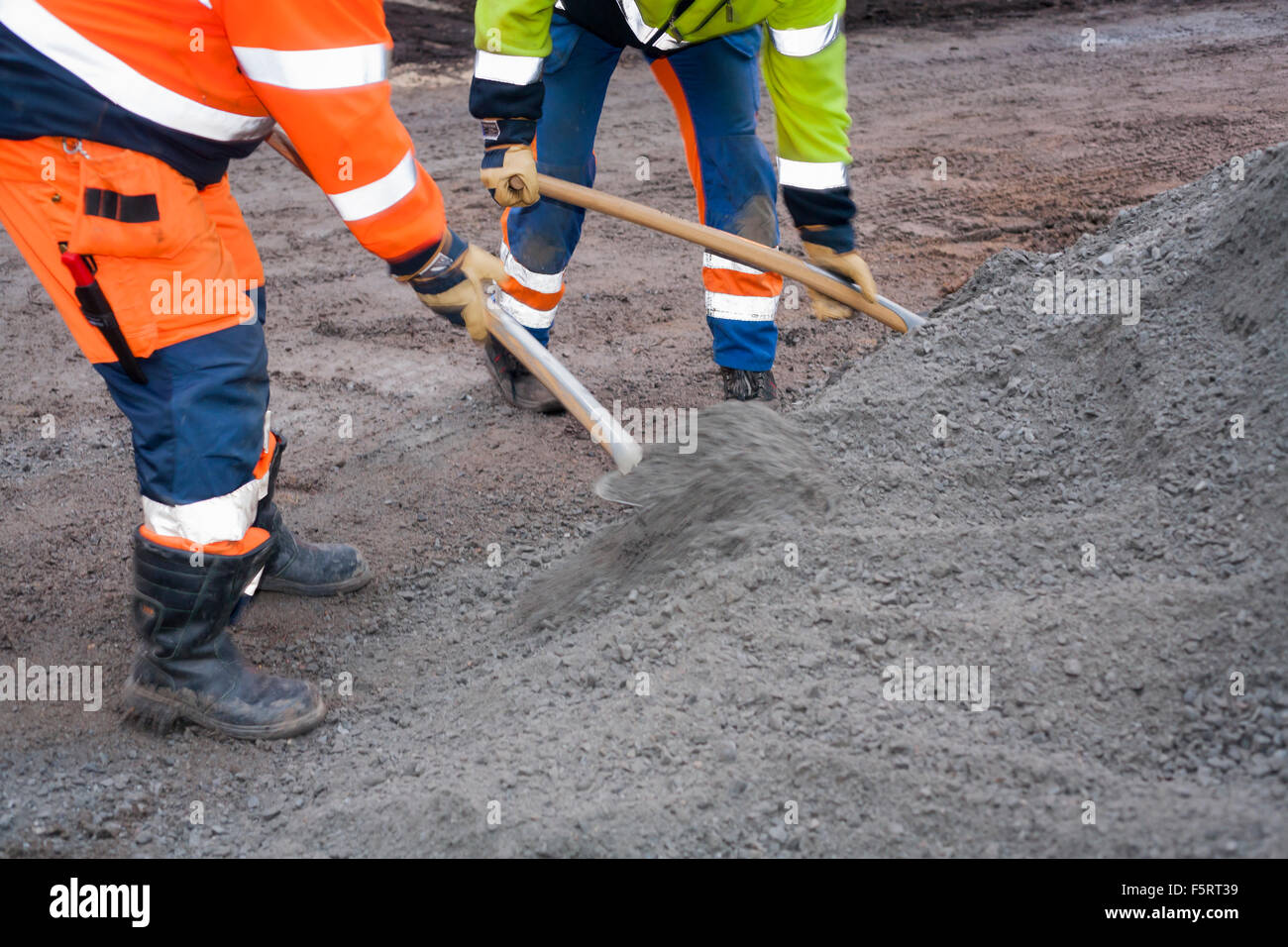 Two men with shovels hi-res stock photography and images - Alamy