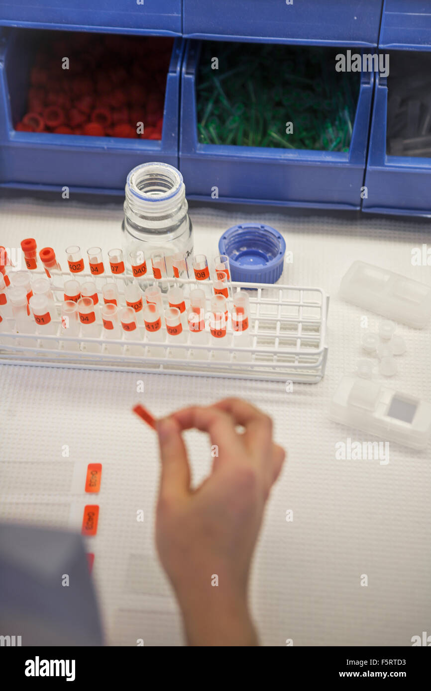 Woman laboratory test tubes hi-res stock photography and images - Alamy