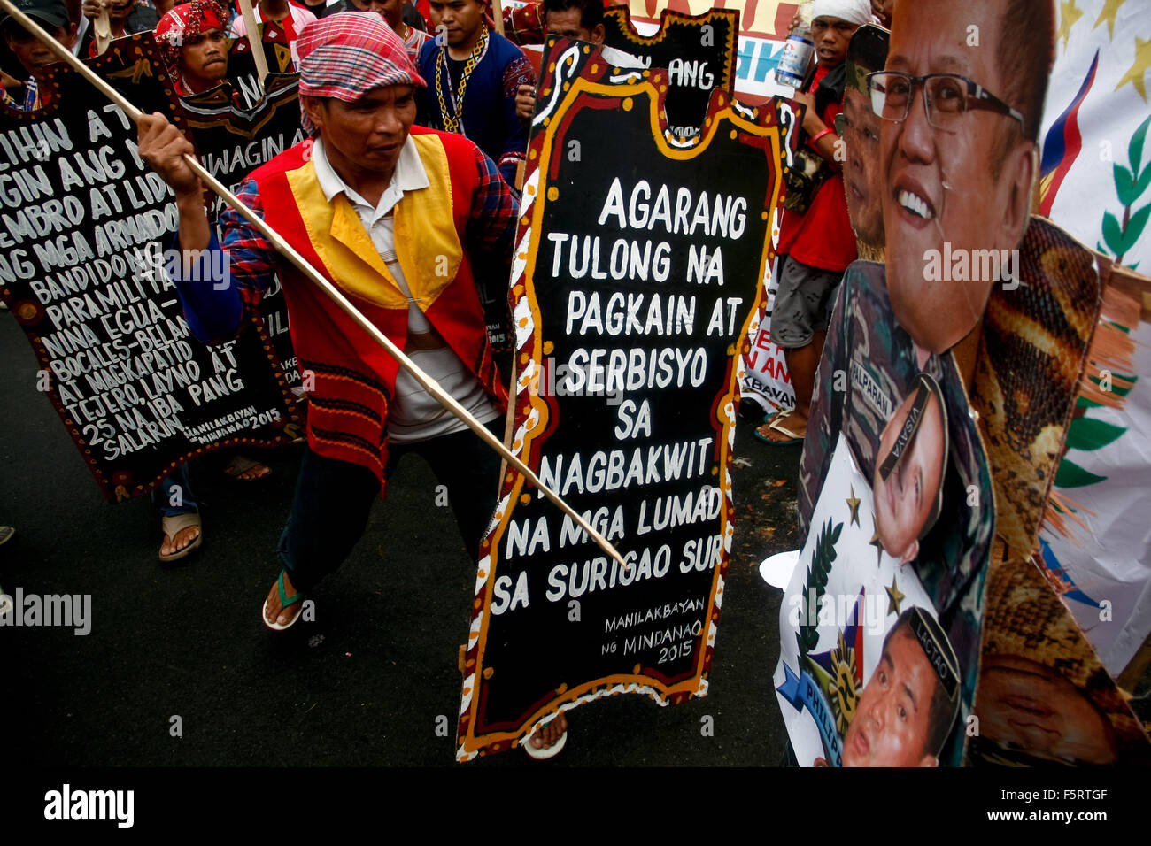 Philippines. 9th Nov, 2015. A Lumad male about to spear a cardboard ...