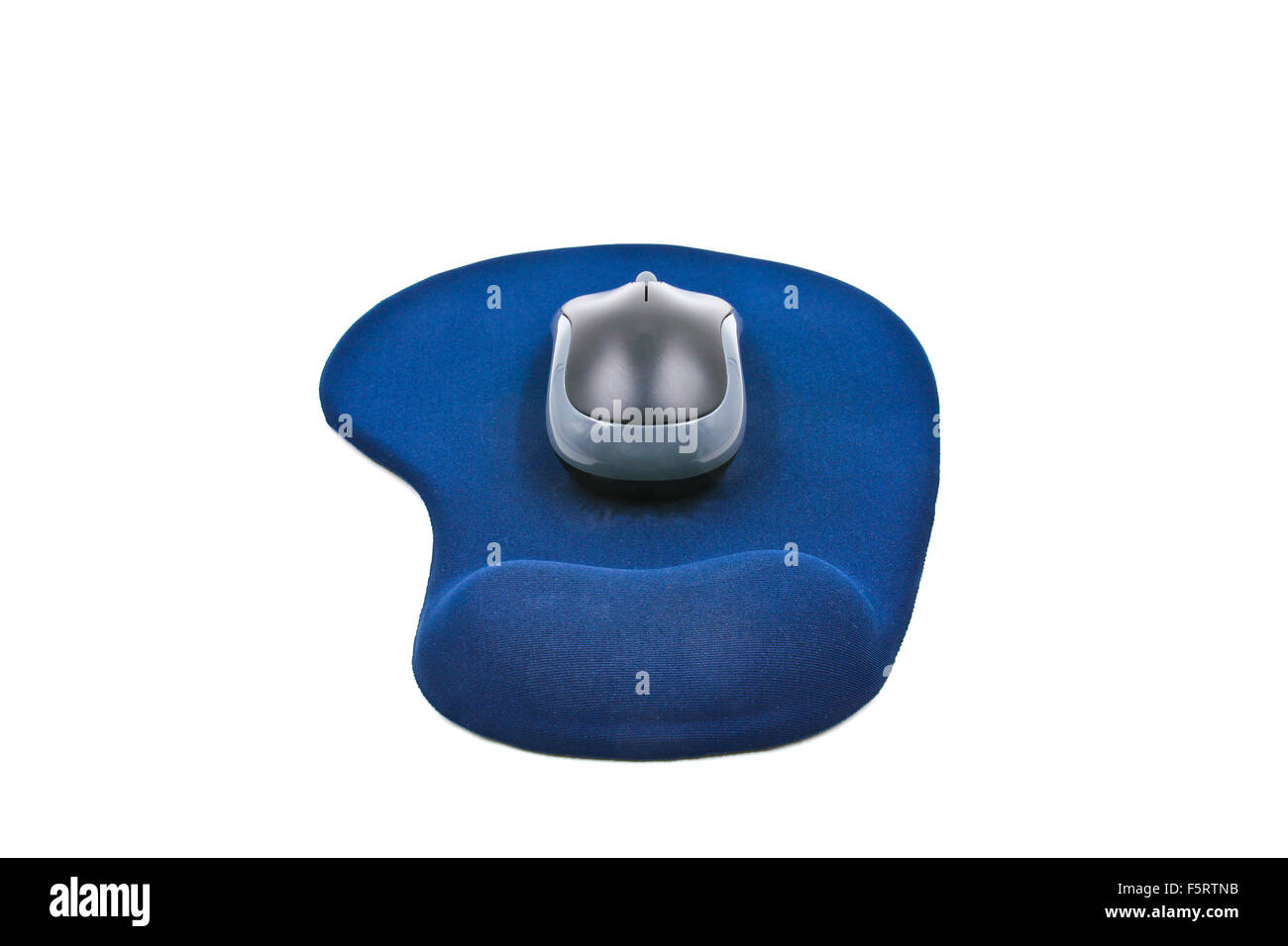 Wireless computer mouse on blue mouse pad isolated on white background ...
