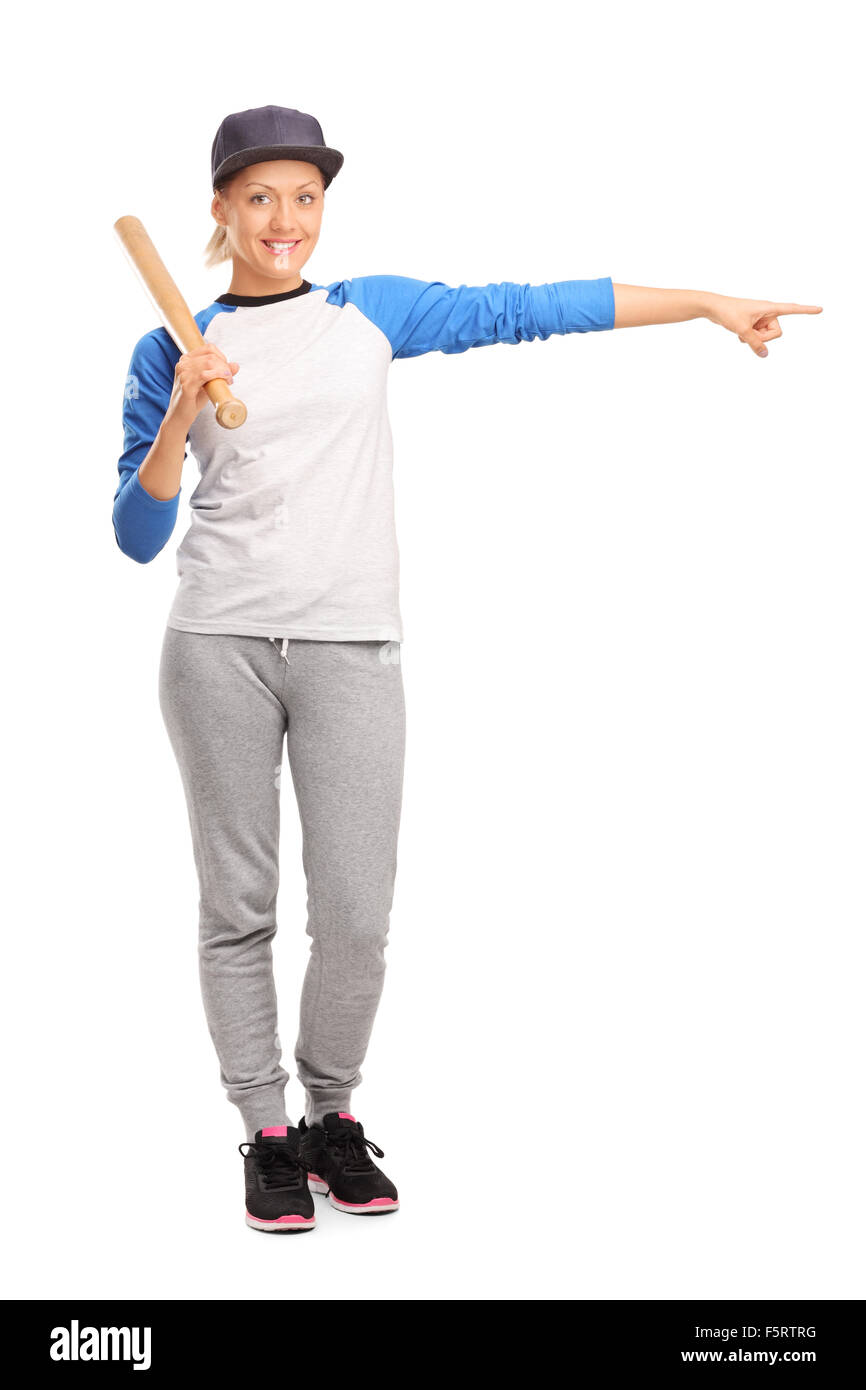 Full length portrait of a female baseball player holding a baseball bat ...