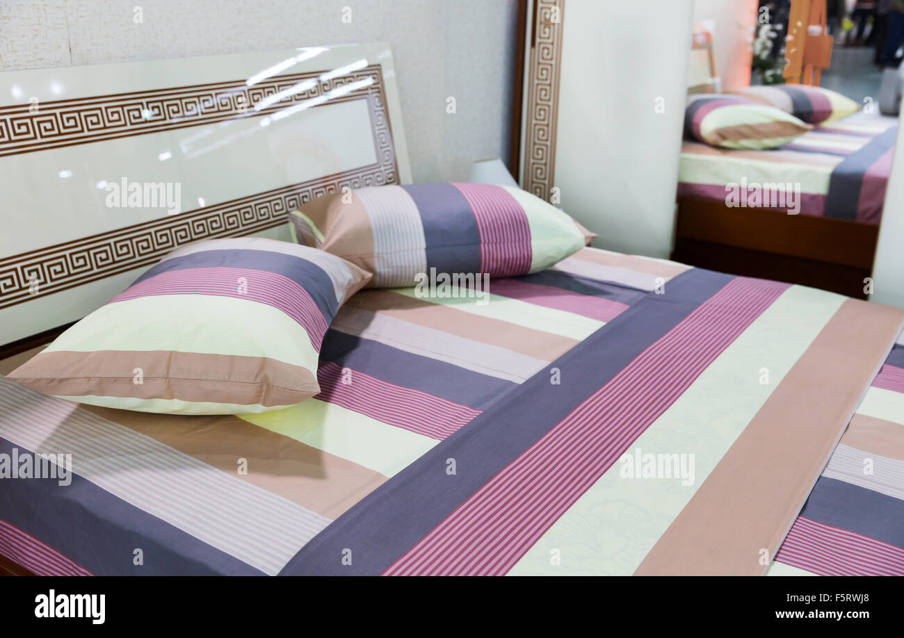 Beautiful modern bed room close up Stock Photo - Alamy