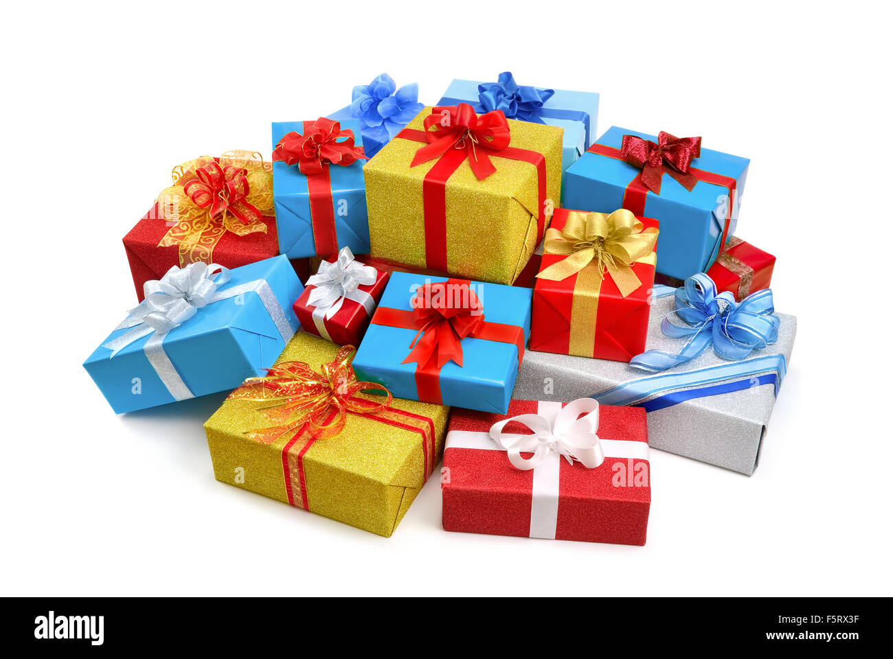 Joyful pile of multi-colored gift boxes with ornate bows, studio ...