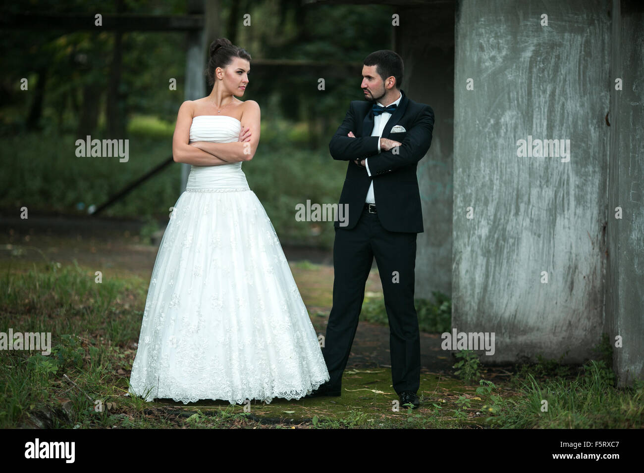 bride and groom having fun Stock Photo - Alamy