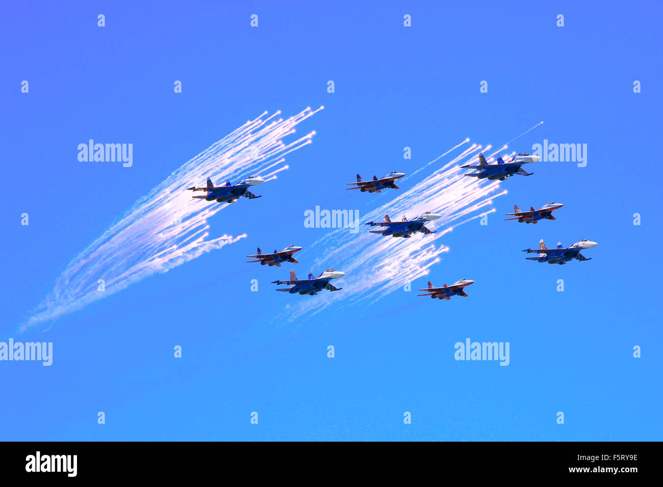 Russian MIG-29 and Su-27 fighter jets flying in front of decoy ...