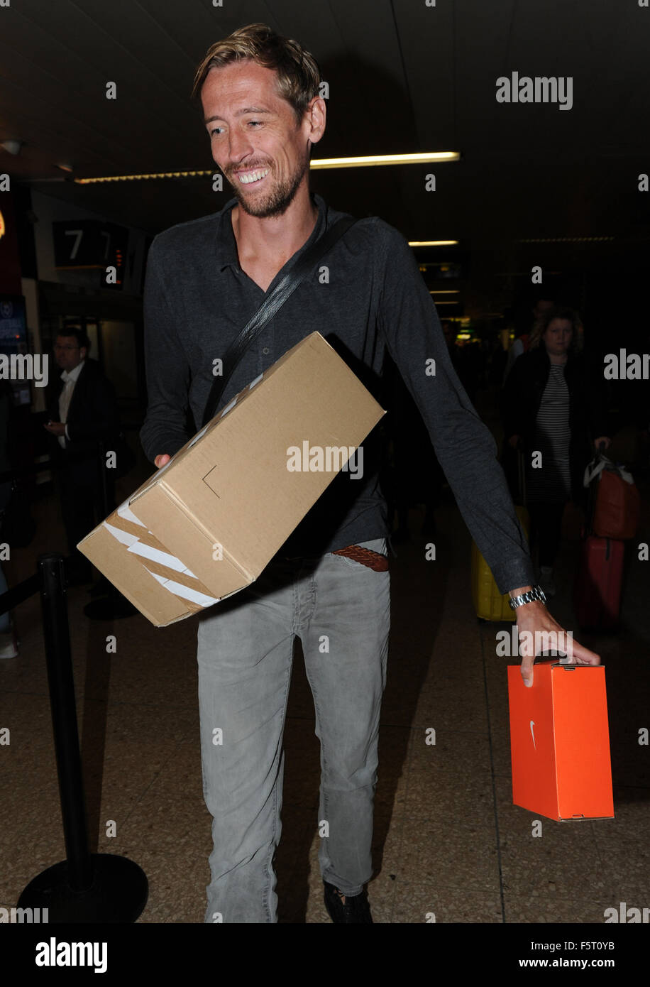 Footballer Peter Crouch seen at Euston railway station in London ...