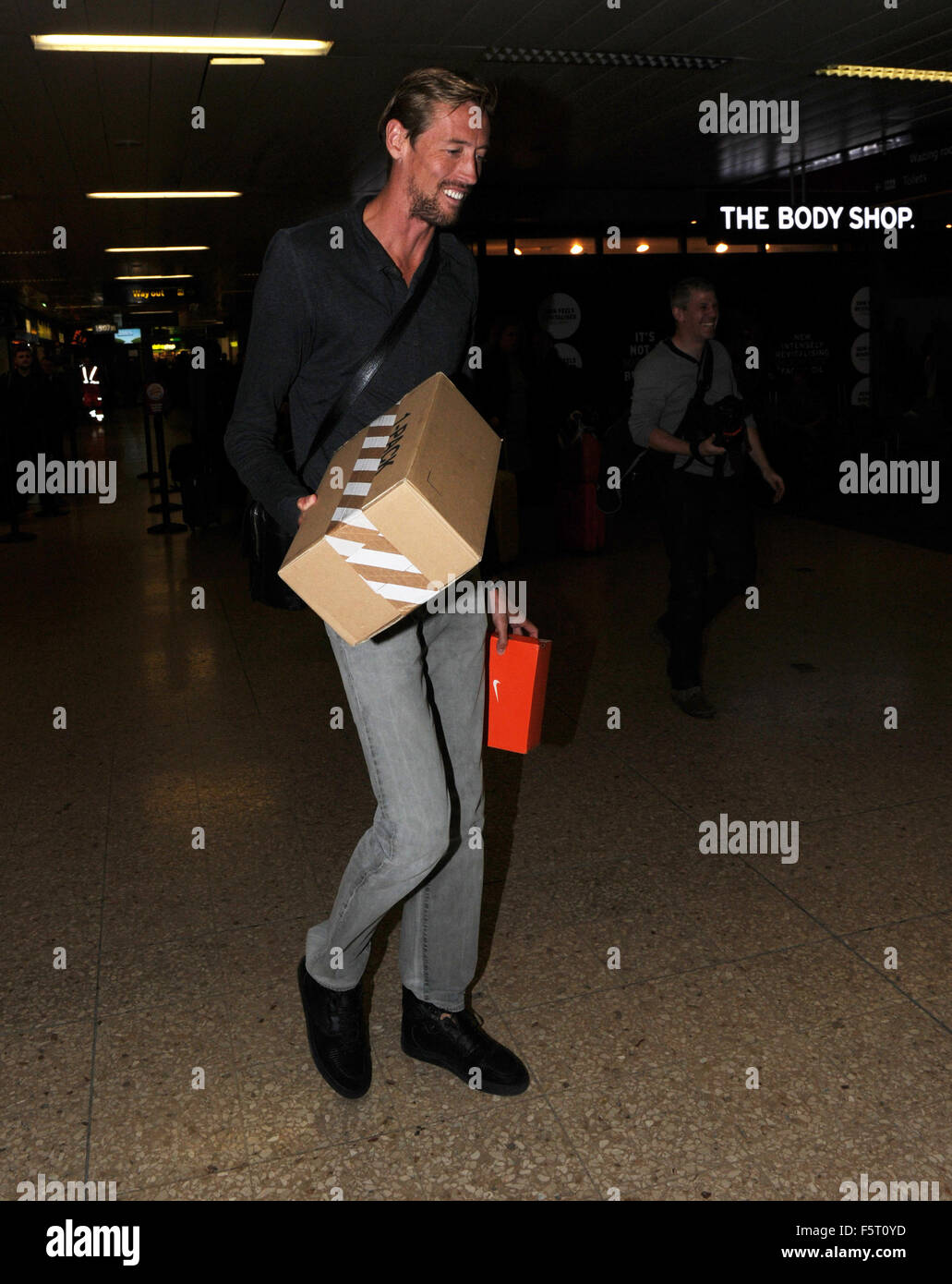Footballer Peter Crouch seen at Euston railway station in London ...