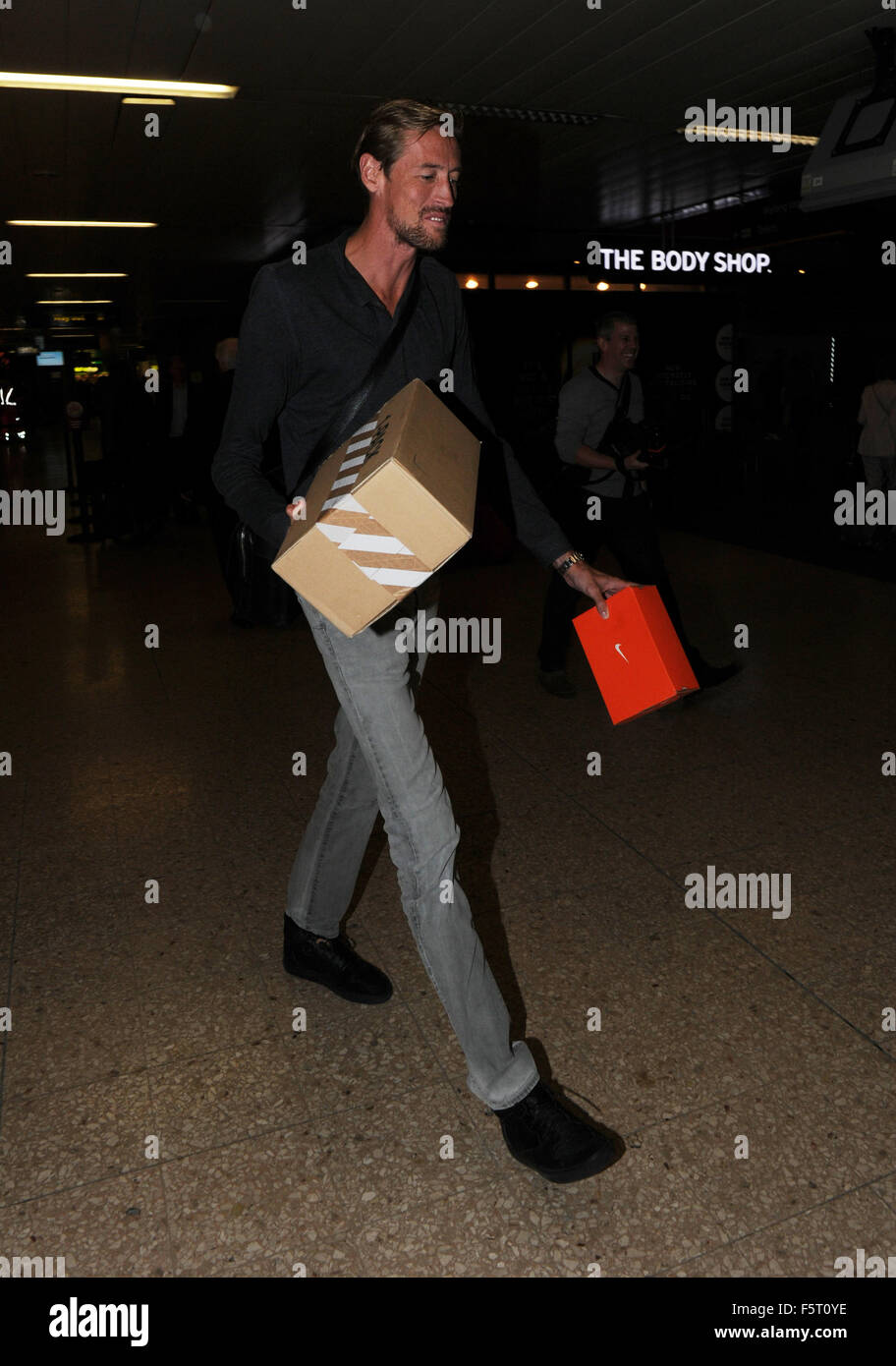 Footballer Peter Crouch seen at Euston railway station in London ...