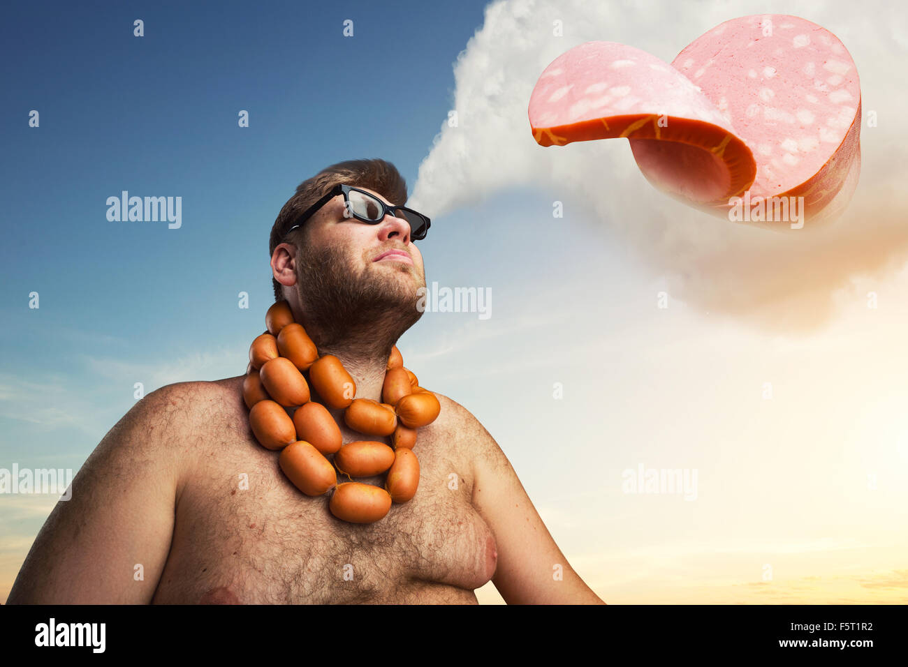 Man with sausages round his neck dreaming about a piece of wurst Stock ...