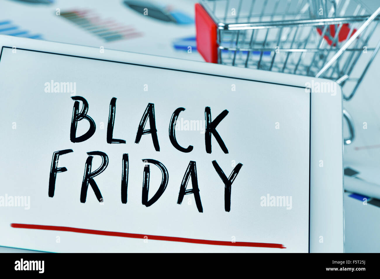 the text black friday written in the screen of a tablet computer and a ...