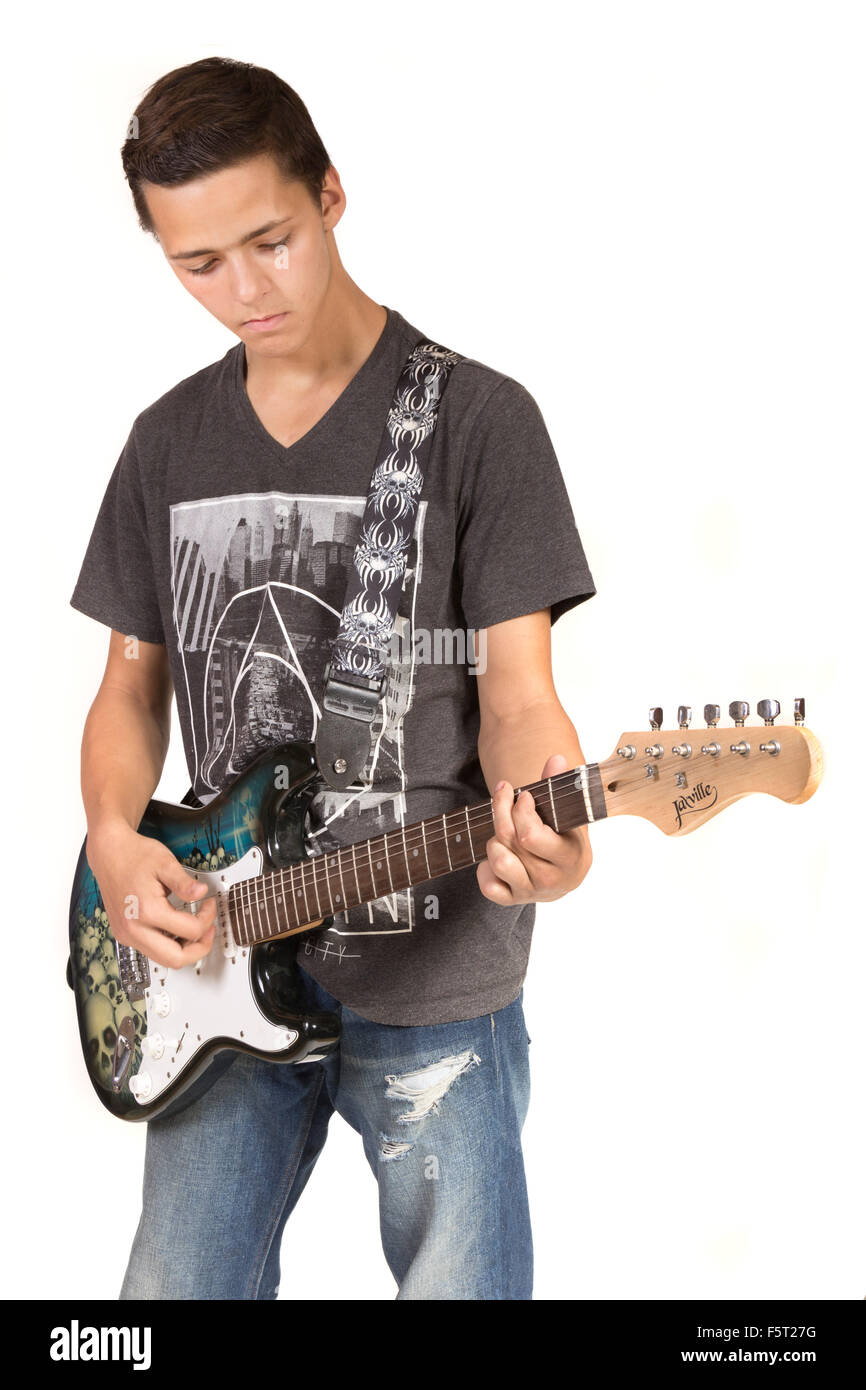 Teenage boy playing an electric guitar Stock Photo - Alamy
