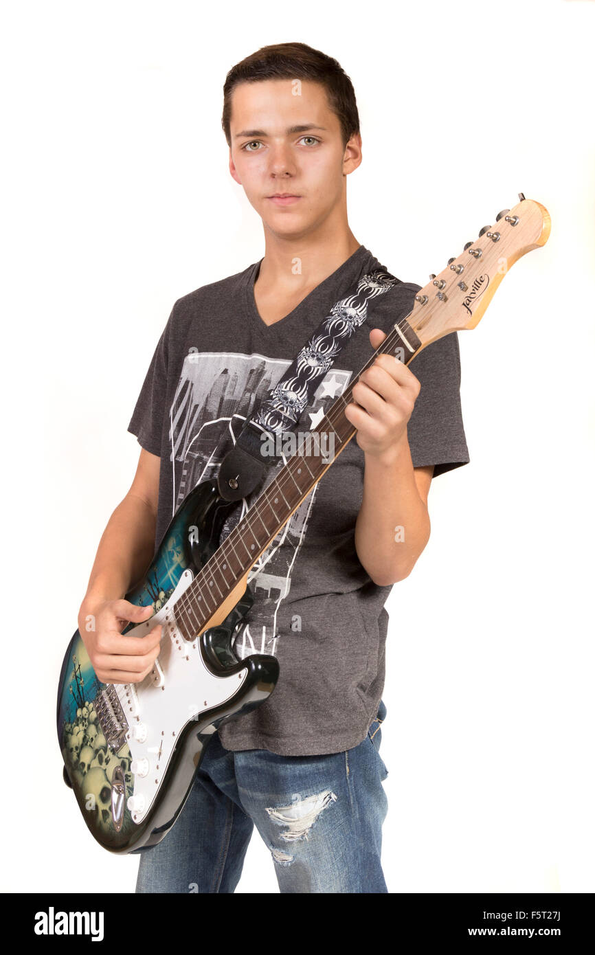 Teenage boy playing an electric guitar Stock Photo - Alamy