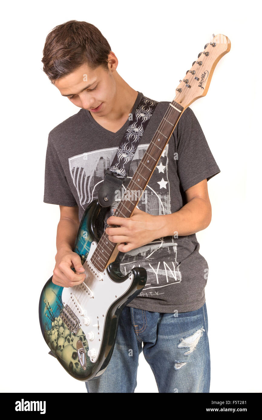 Teenage boy playing an electric guitar Stock Photo - Alamy