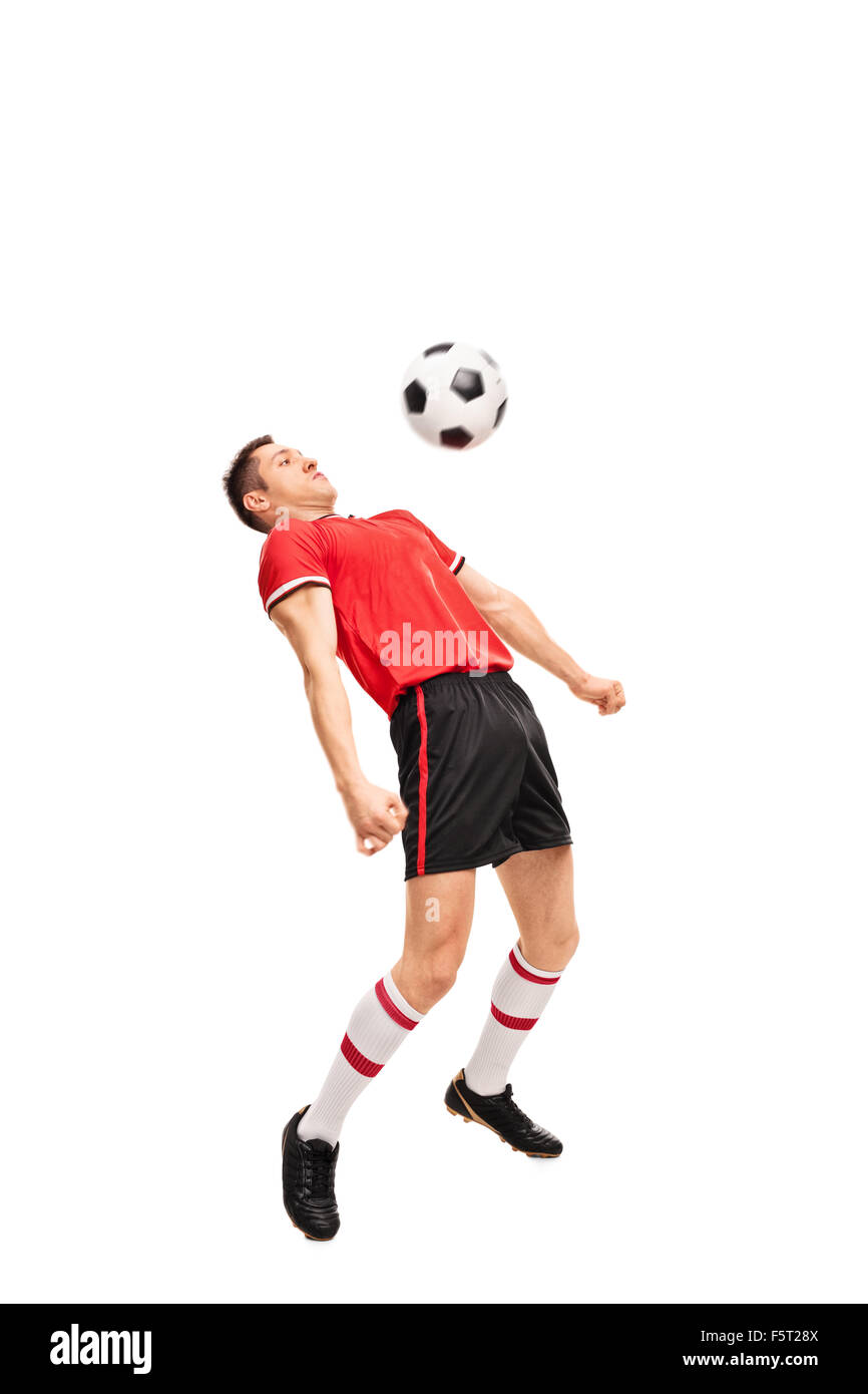 Full length portrait of a young sportsman in red jersey playing ...