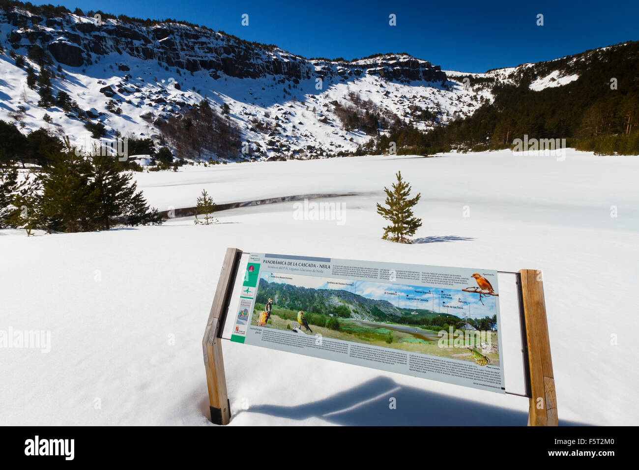 Snow-capped mountain, signal and frozen lake in nature Stock Photo - Alamy