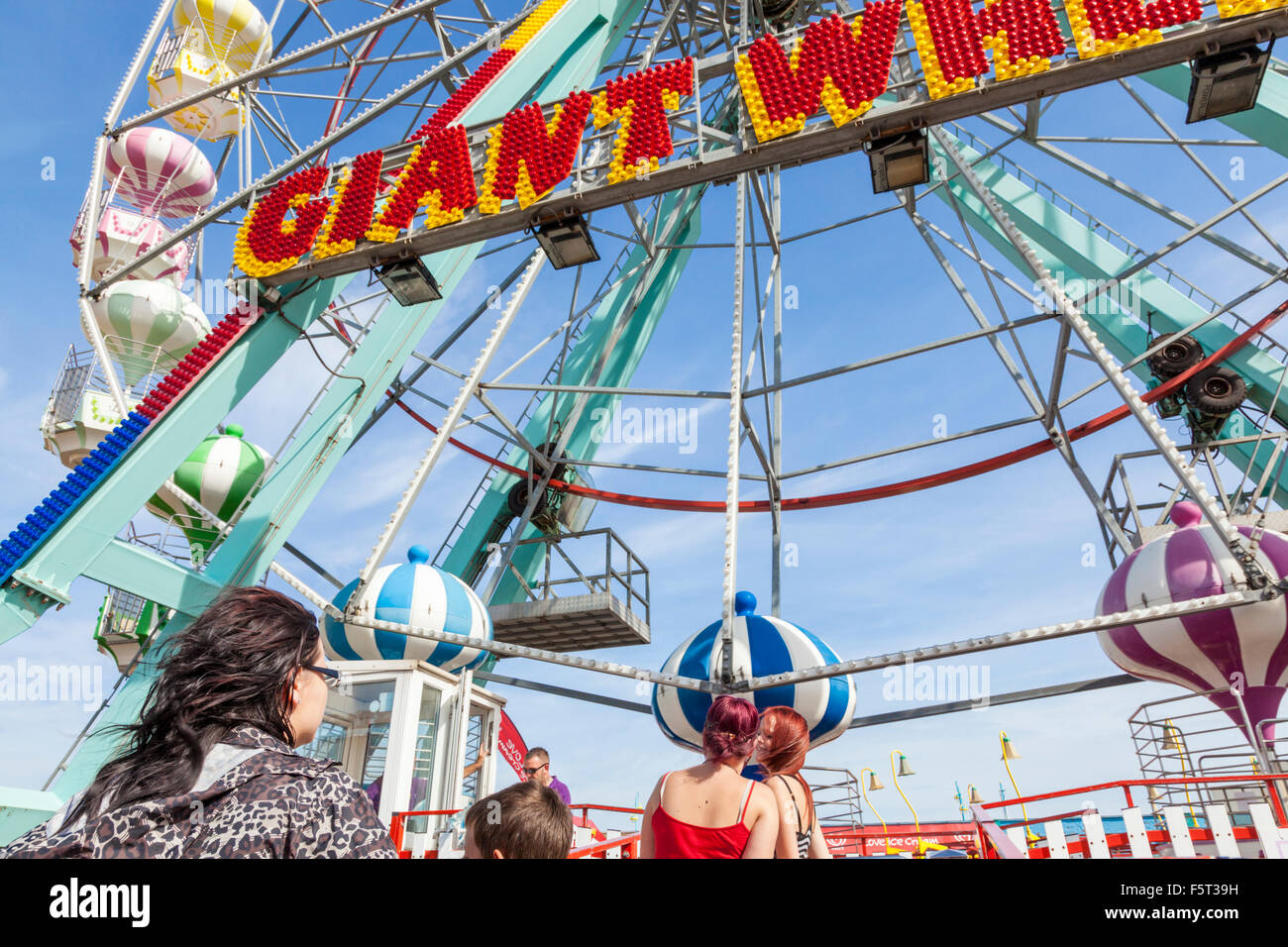 People getting on a big wheel ride. The Giant Wheel, Pleasure Beach ...