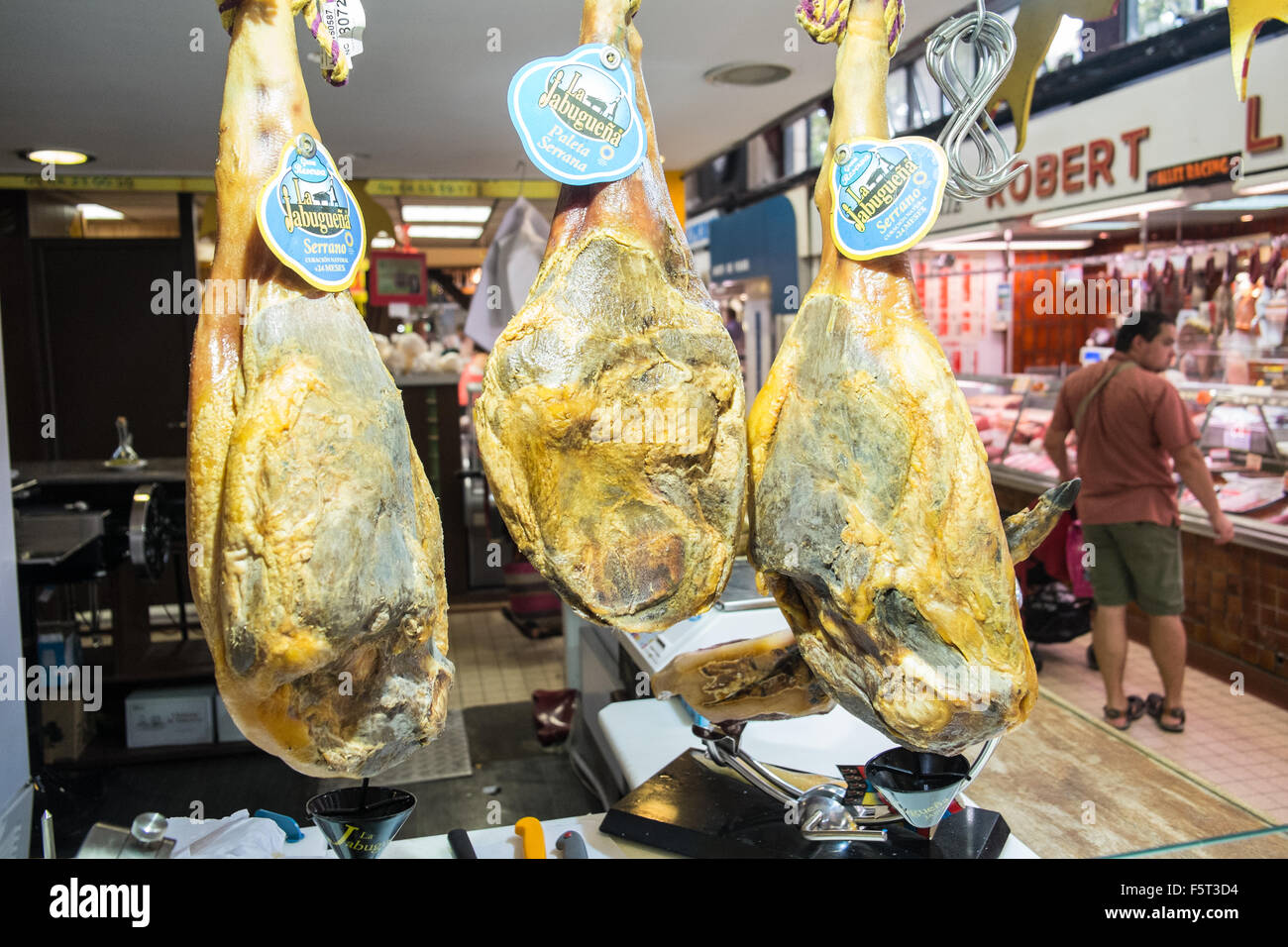 Specialty ham,food,hanging at indoor market at Narbonne,Aude,South ...