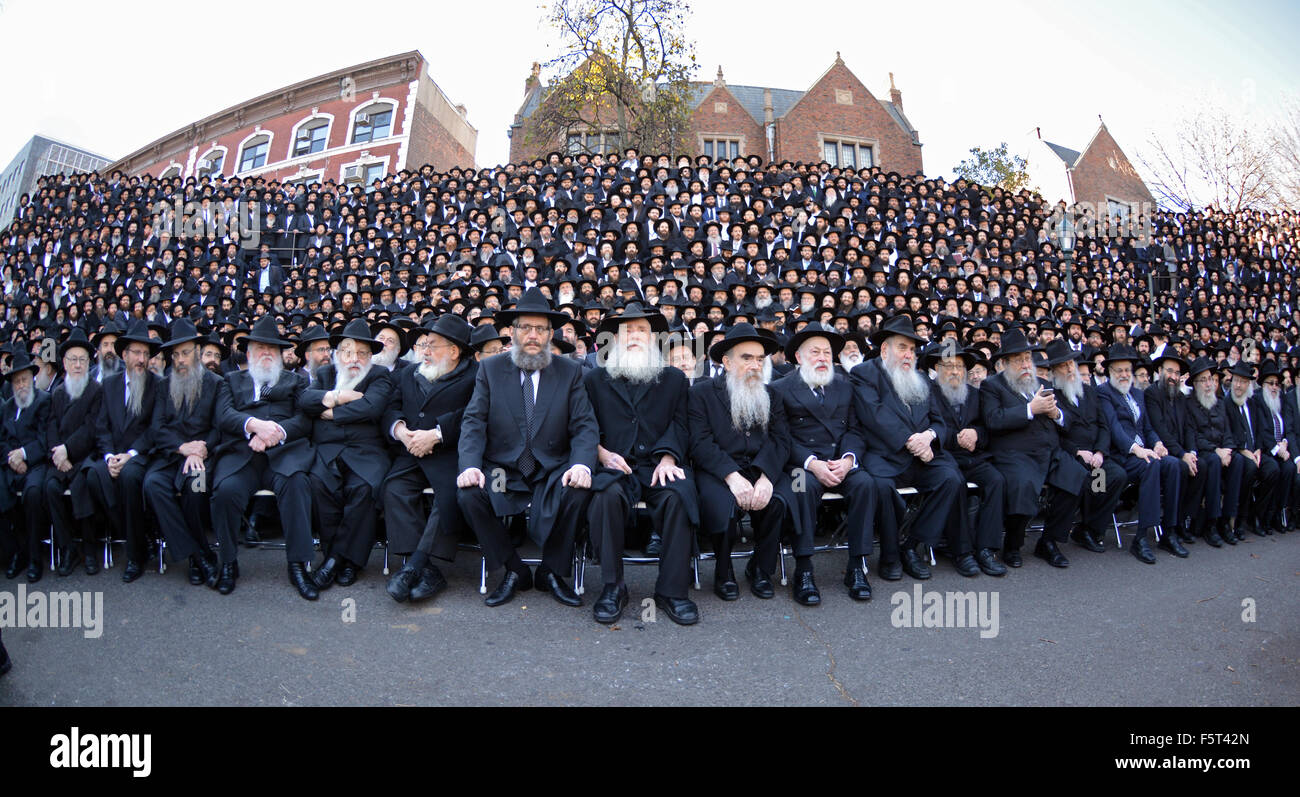 Fisheye lens view of thousands of orthodox rabbis seated preparing for ...