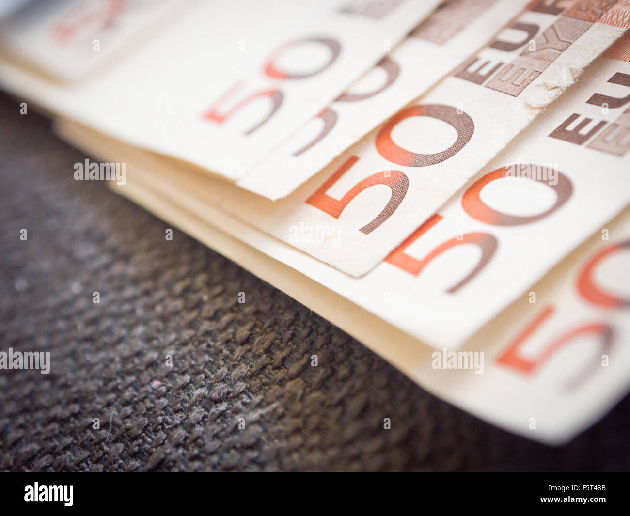 Euros with dark background. Concepts for money Stock Photo - Alamy