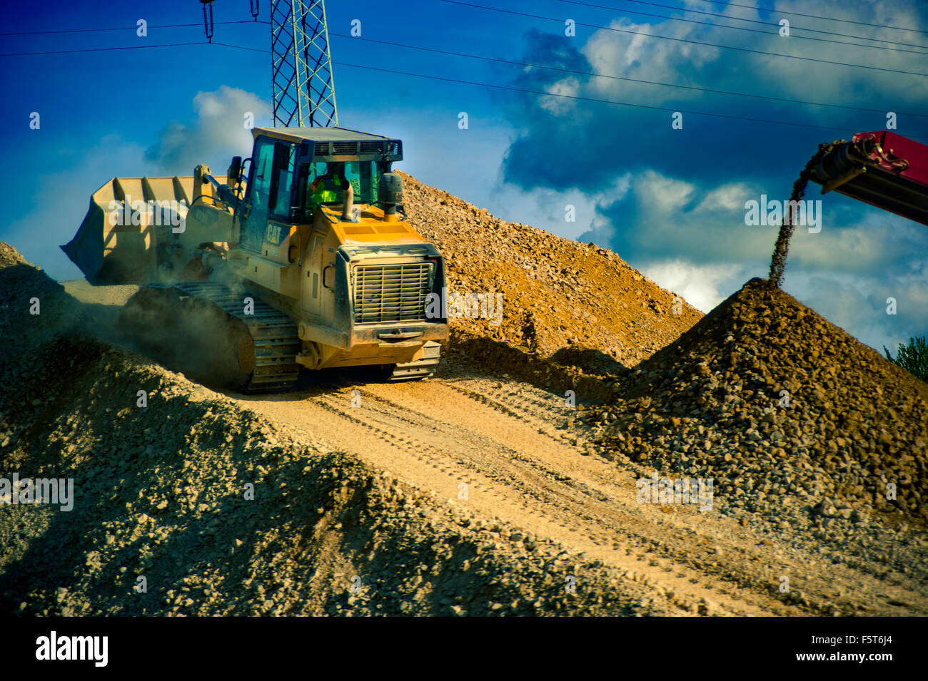 Caterpillar bulldozer at work on construction site Stock Photo - Alamy