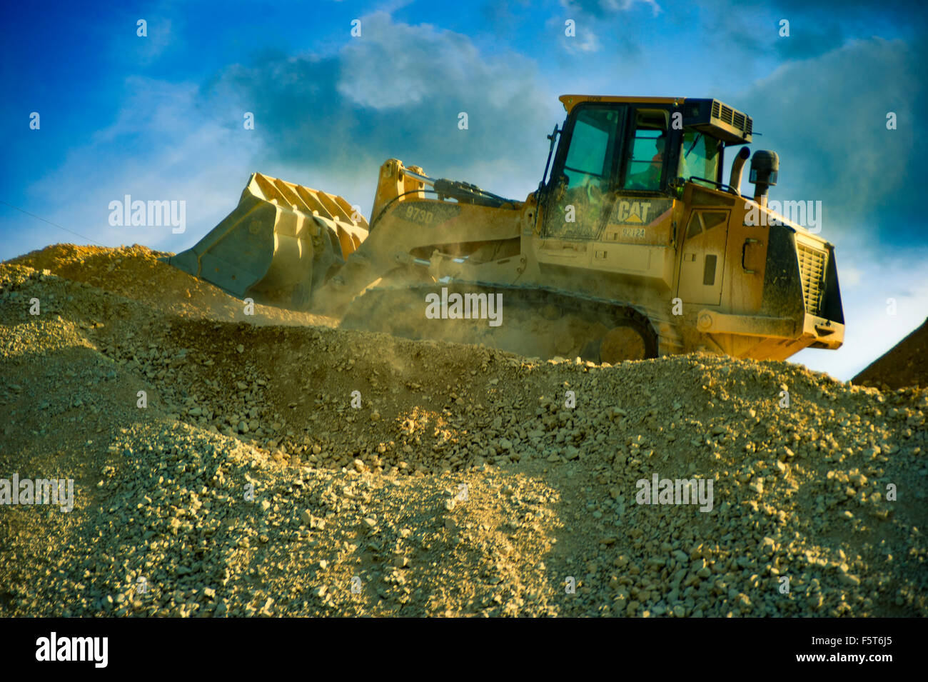 Caterpillar bulldozer at work on construction site Stock Photo - Alamy