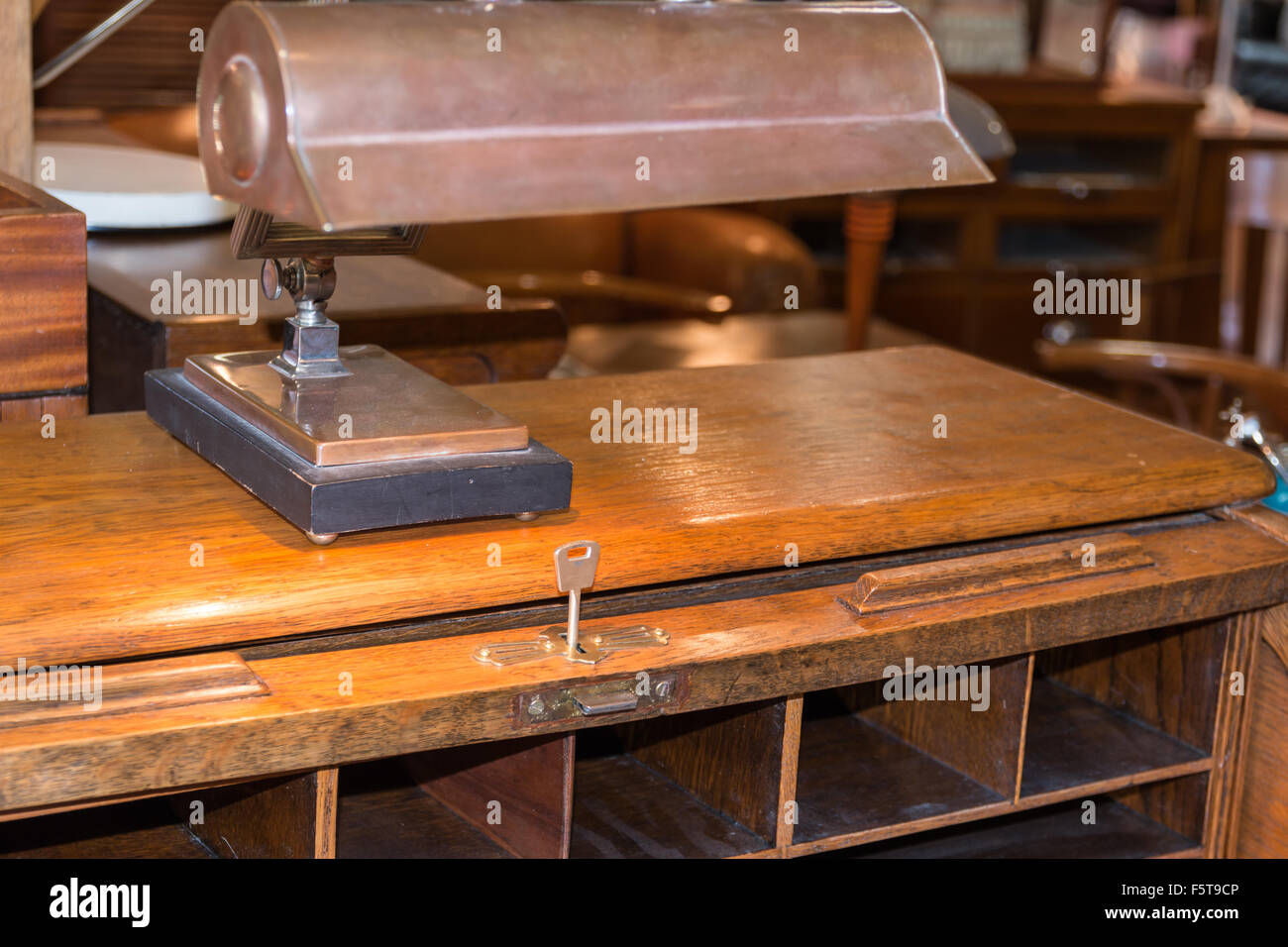 antique wooden writing desk with lamp, key lock and compartments Stock ...