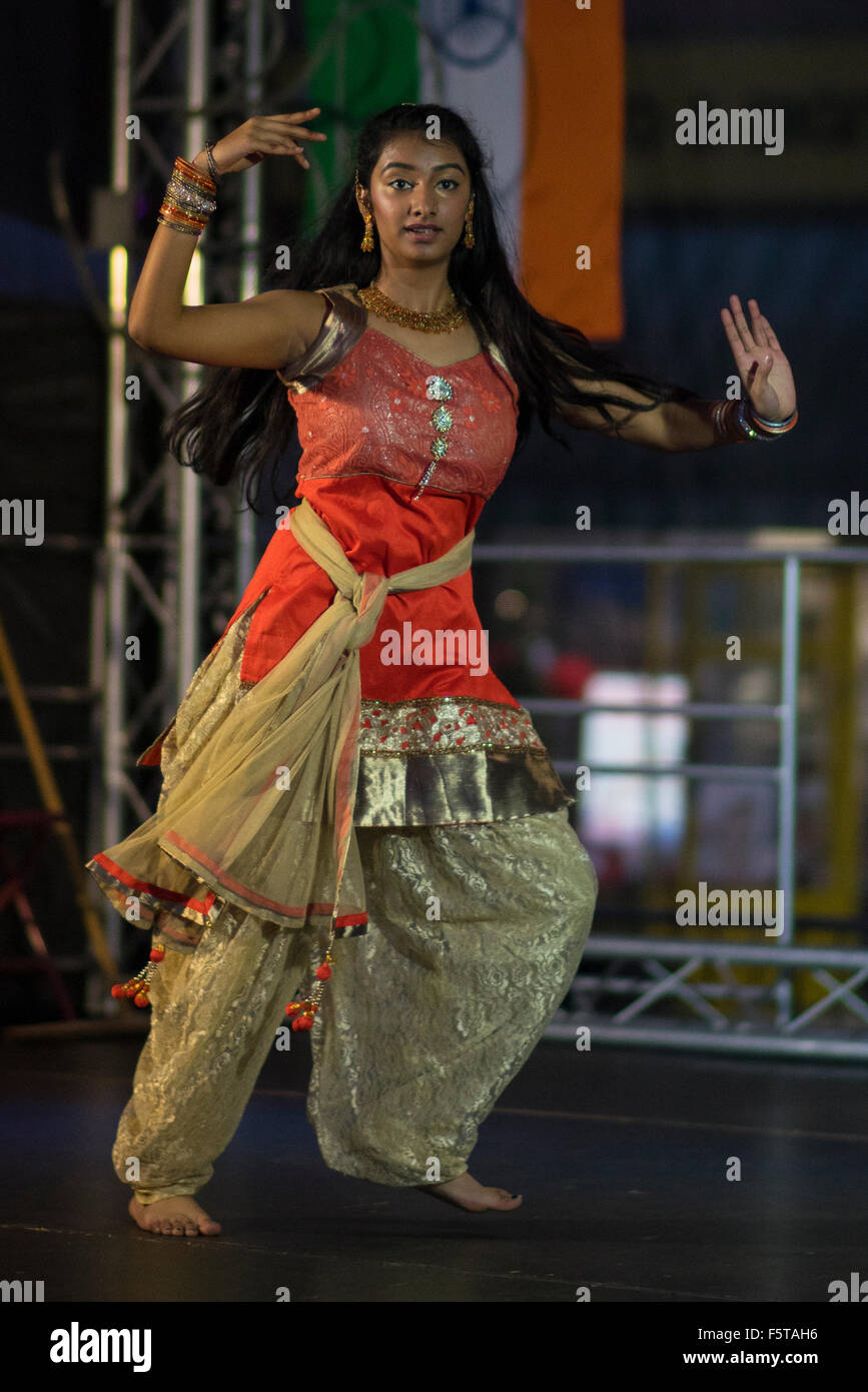 Indian dancers on stage wearing traditional costume Stock Photo - Alamy