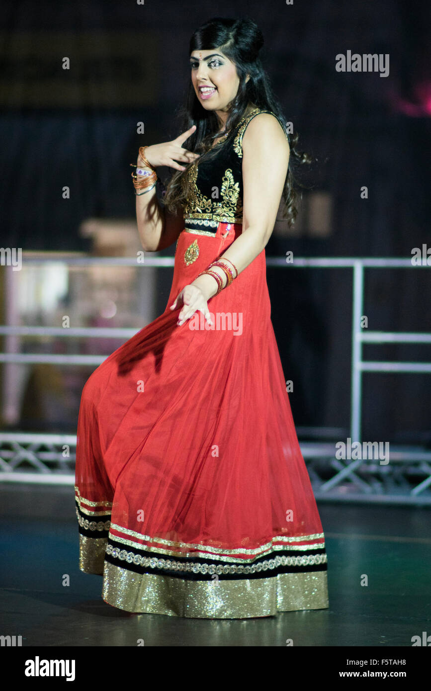 Indian dancers on stage wearing traditional costume Stock Photo - Alamy