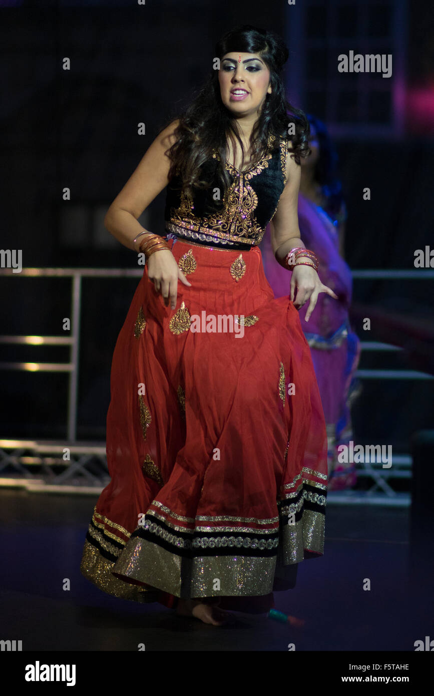 Indian dancers on stage wearing traditional costume Stock Photo - Alamy
