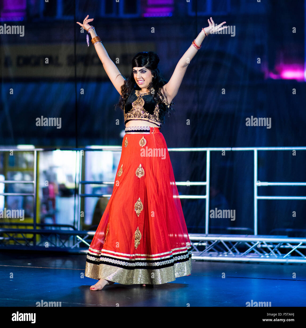 Indian dancers on stage wearing traditional costume Stock Photo - Alamy
