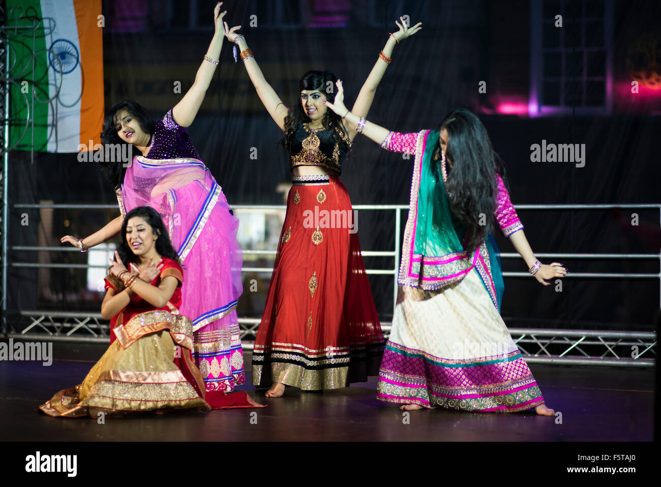 Indian dancers on stage wearing traditional costume Stock Photo - Alamy