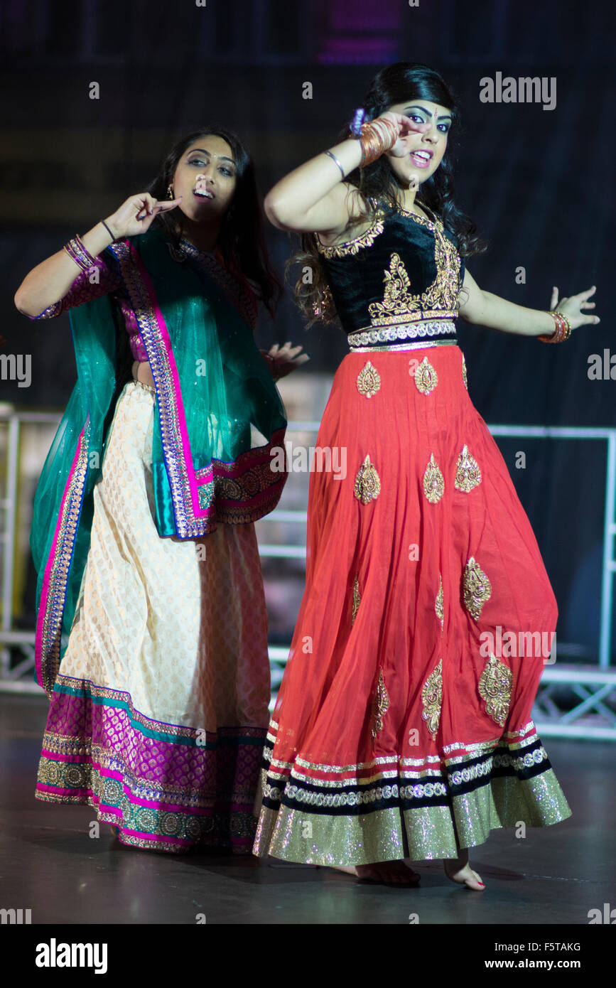 Indian dancers on stage wearing traditional costume Stock Photo - Alamy