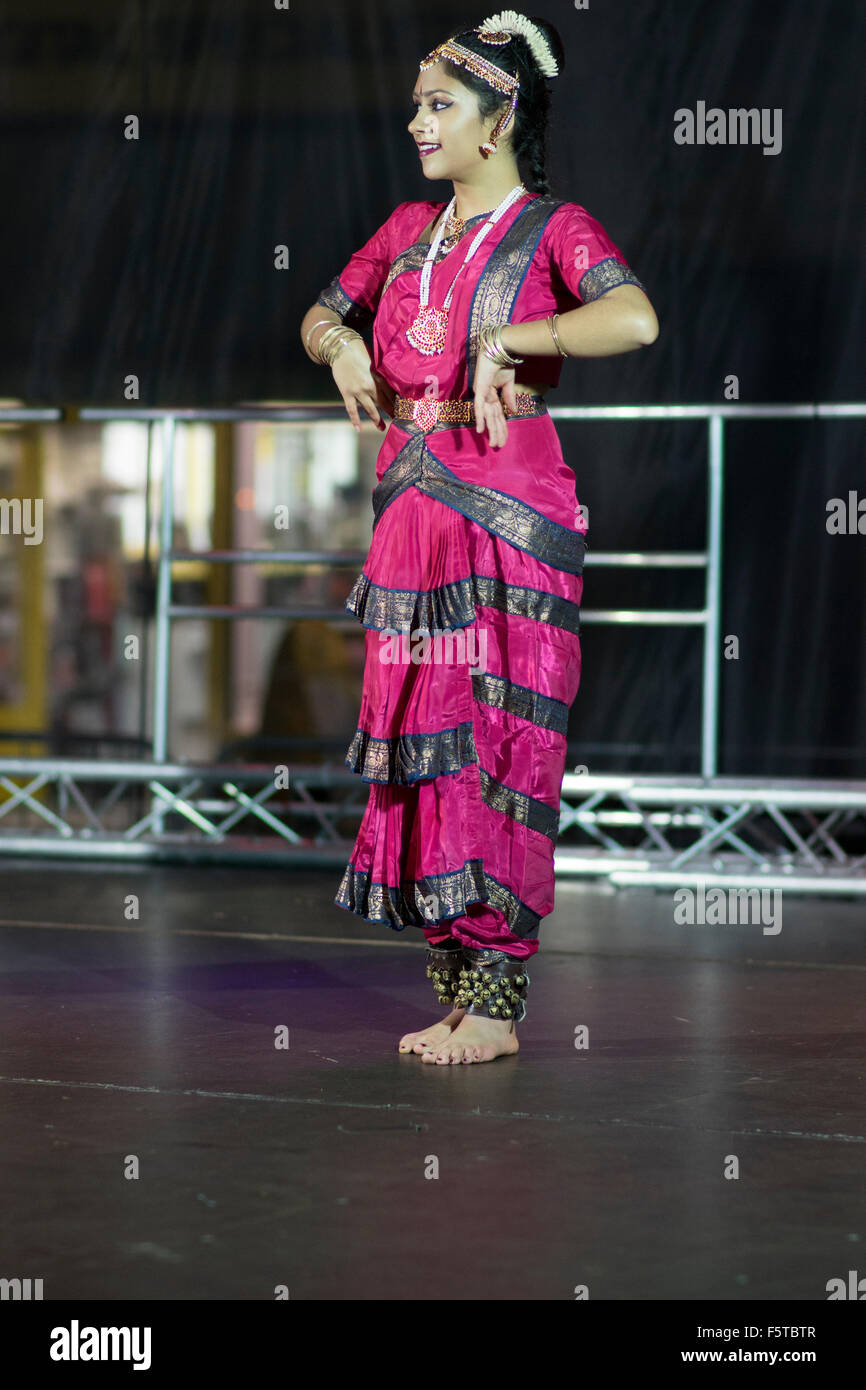 Indian dancers on stage wearing traditional costume Stock Photo - Alamy