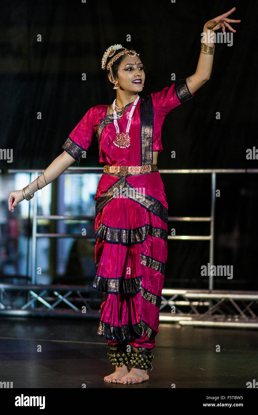 Indian dancers on stage wearing traditional costume Stock Photo - Alamy