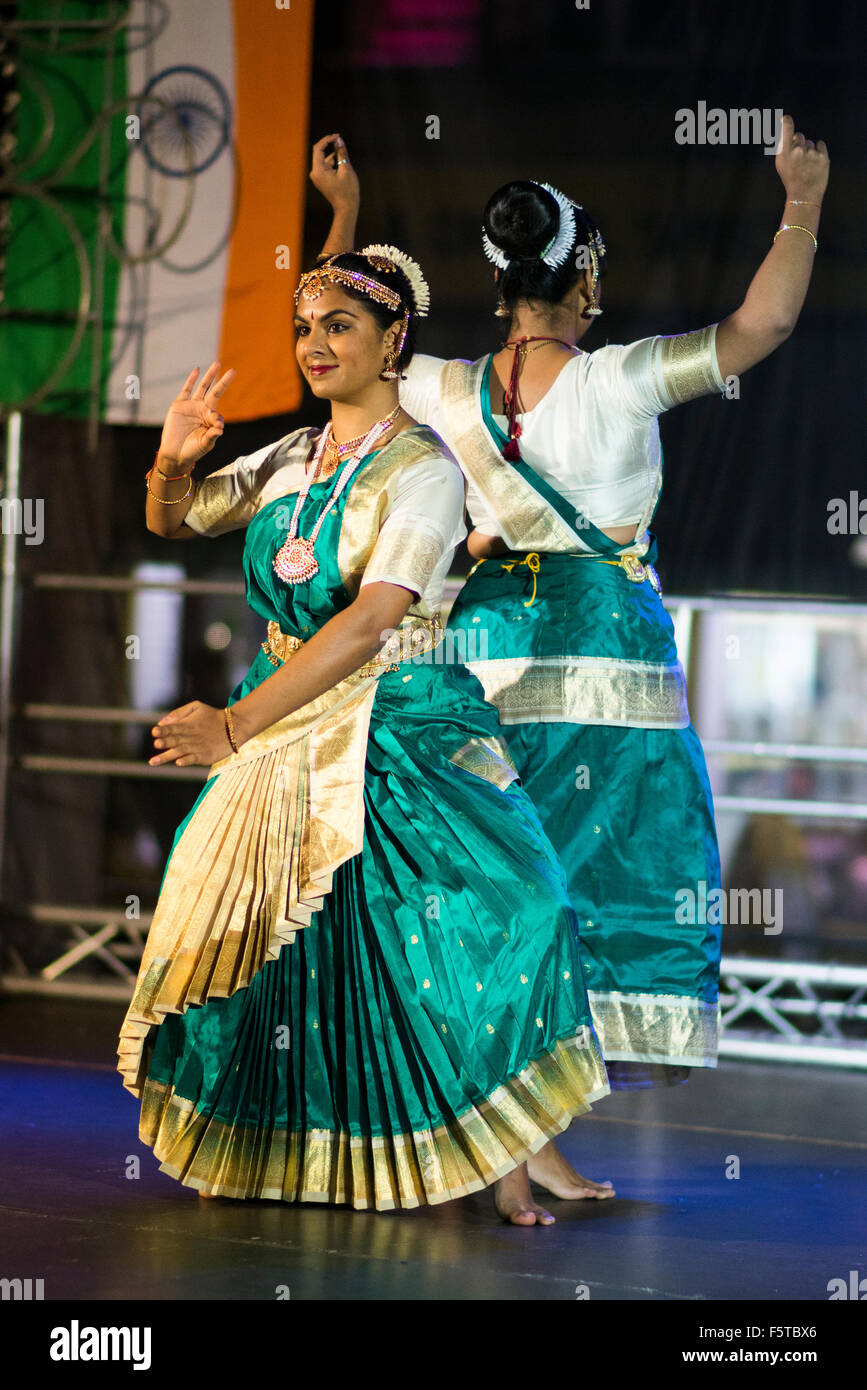 Indian dancers on stage wearing traditional costume Stock Photo - Alamy