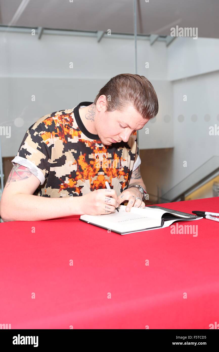 British rapper Professor Green signs copies of his autobiography 'Lucky ...