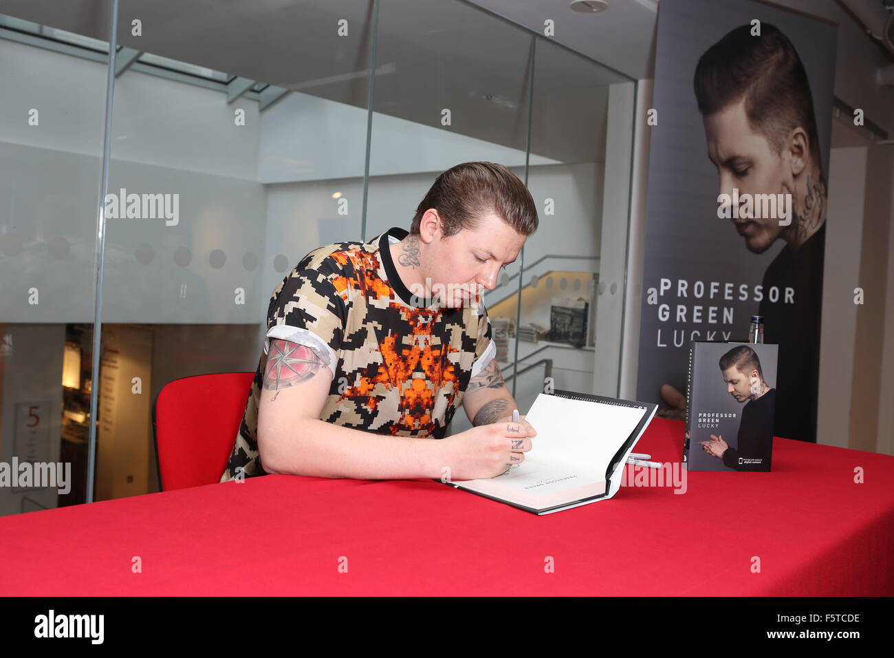 British rapper Professor Green signs copies of his autobiography 'Lucky ...