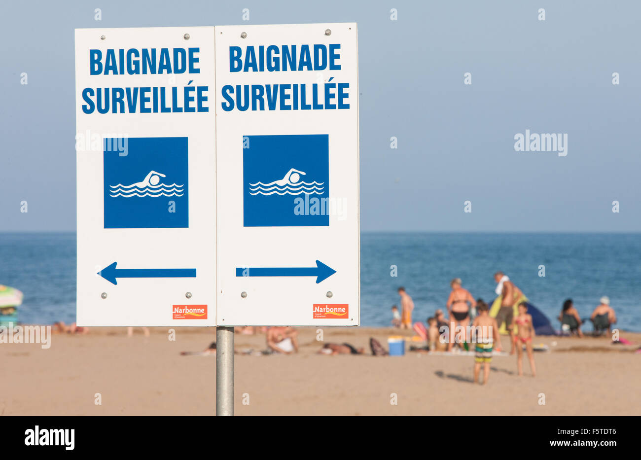 Sign for lifeguard supervised safe swimming zones hi-res stock ...