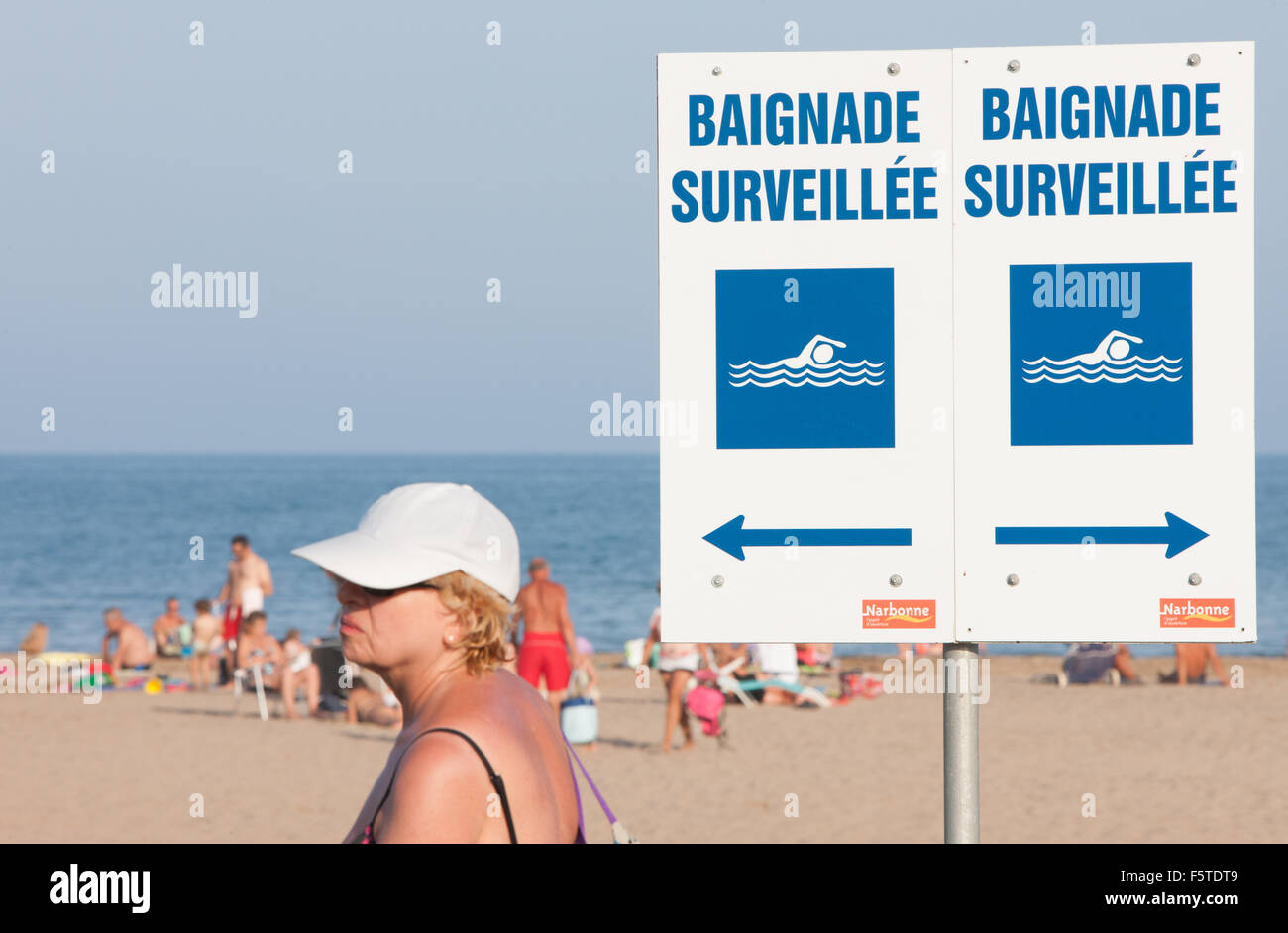 Sign for lifeguard supervised safe swimming zones hi-res stock ...