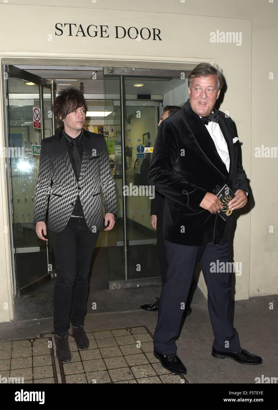 Stephen Fry and partner leaving via stage door Featuring: Stephen Fry ...