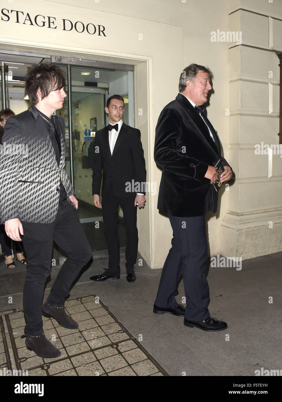 Stephen Fry and partner leaving via stage door Featuring: Stephen Fry ...