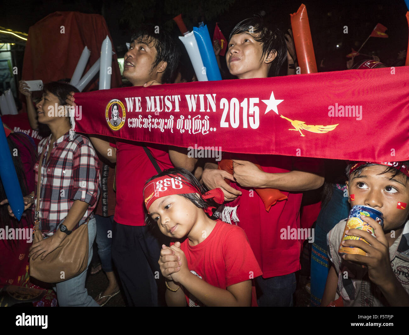 Yangon, Yangon Division, Myanmar. 9th Nov, 2015. People watch the ...