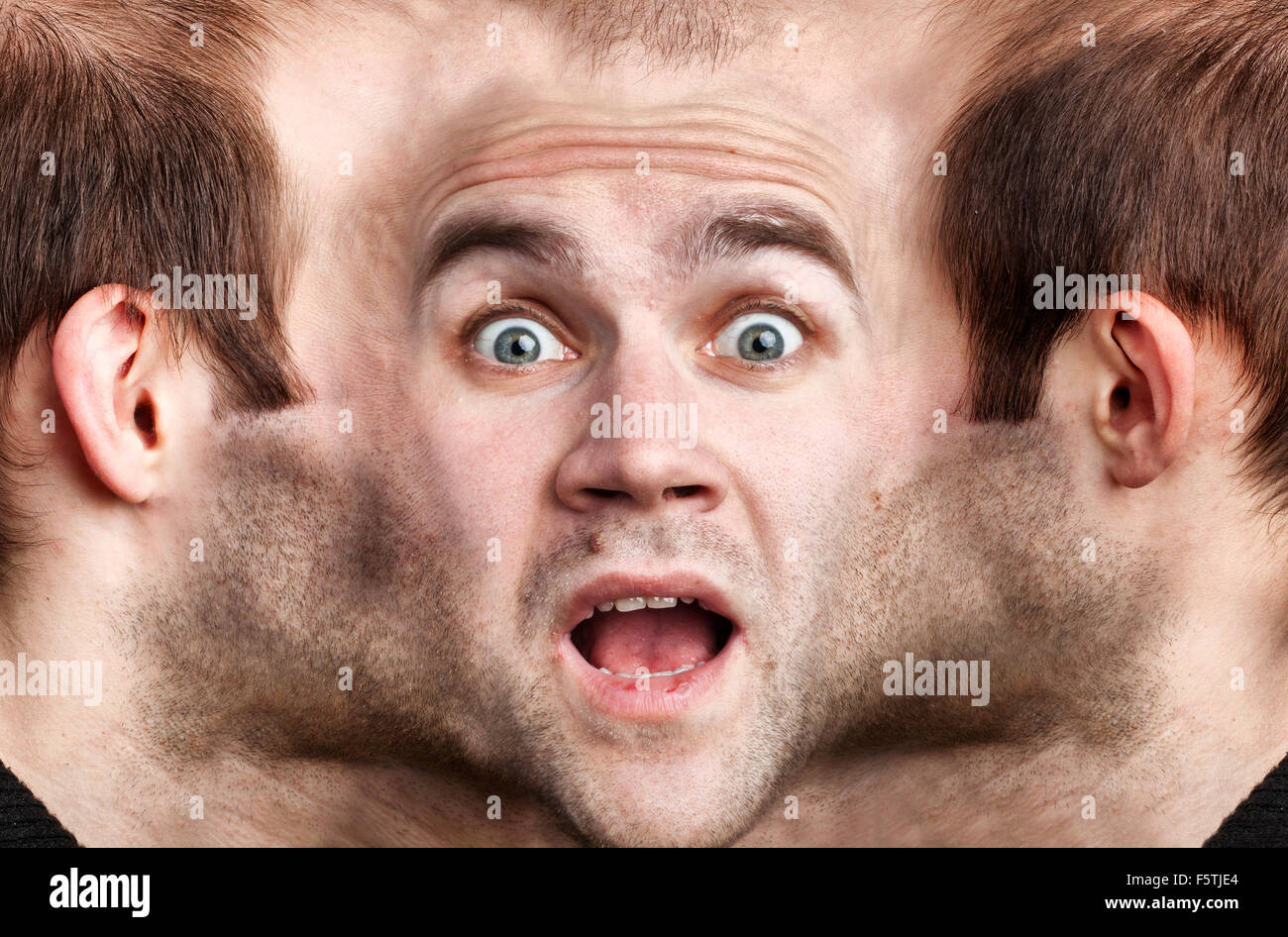A panoramic face of very frightened man Stock Photo - Alamy