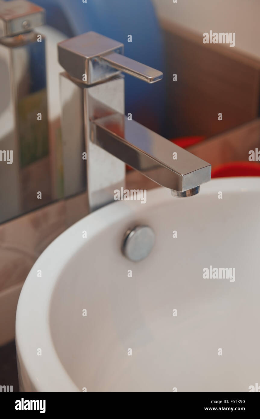 Sink and water tap. Horizontal close-up photo Stock Photo - Alamy