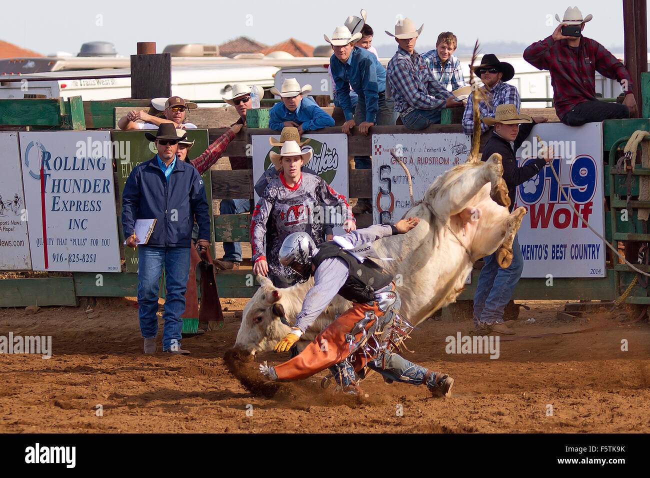 Young women compete in barrel racing at the Lincoln, California Rodeo ...