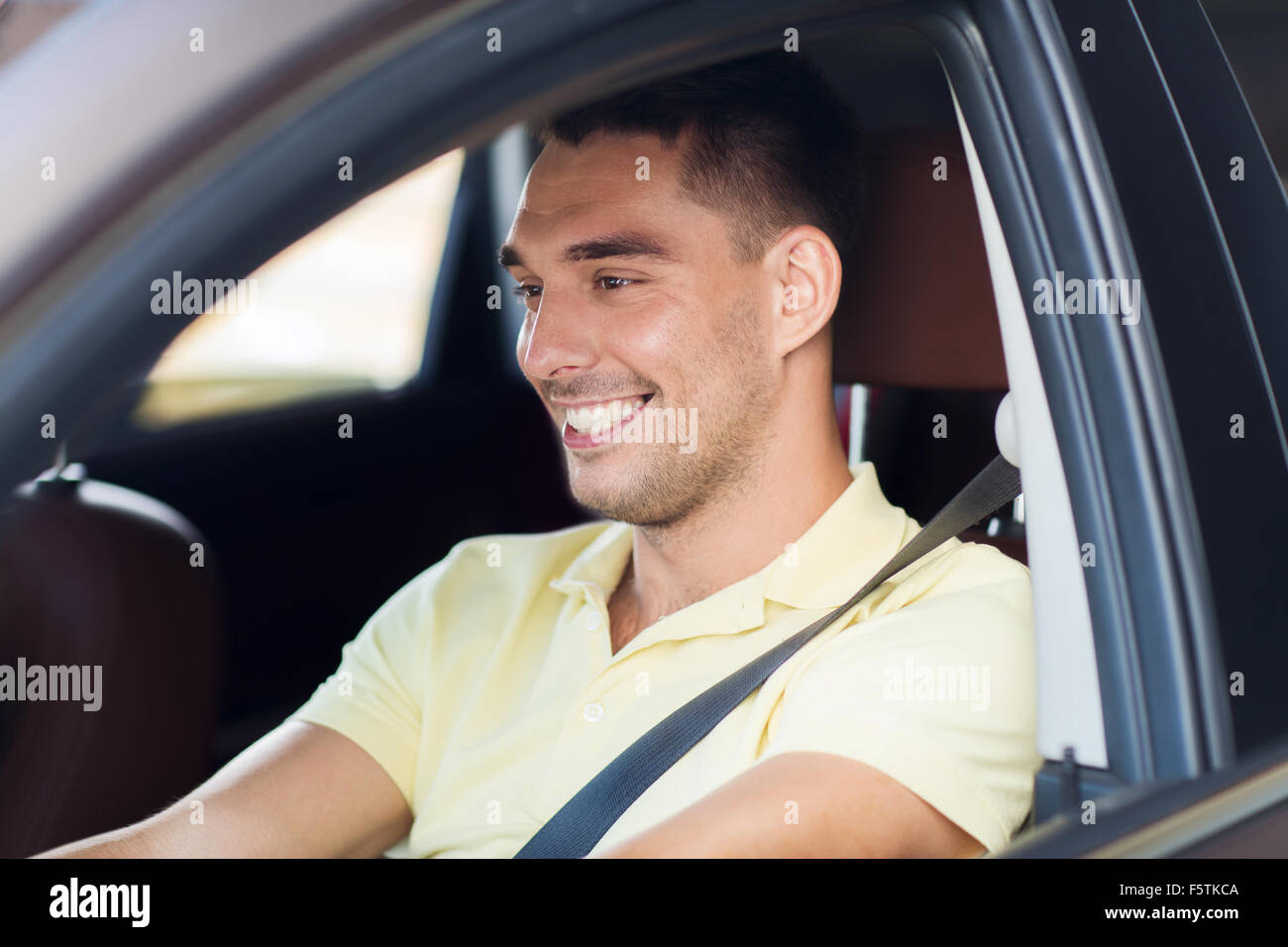 happy smiling man driving car outdoors Stock Photo - Alamy