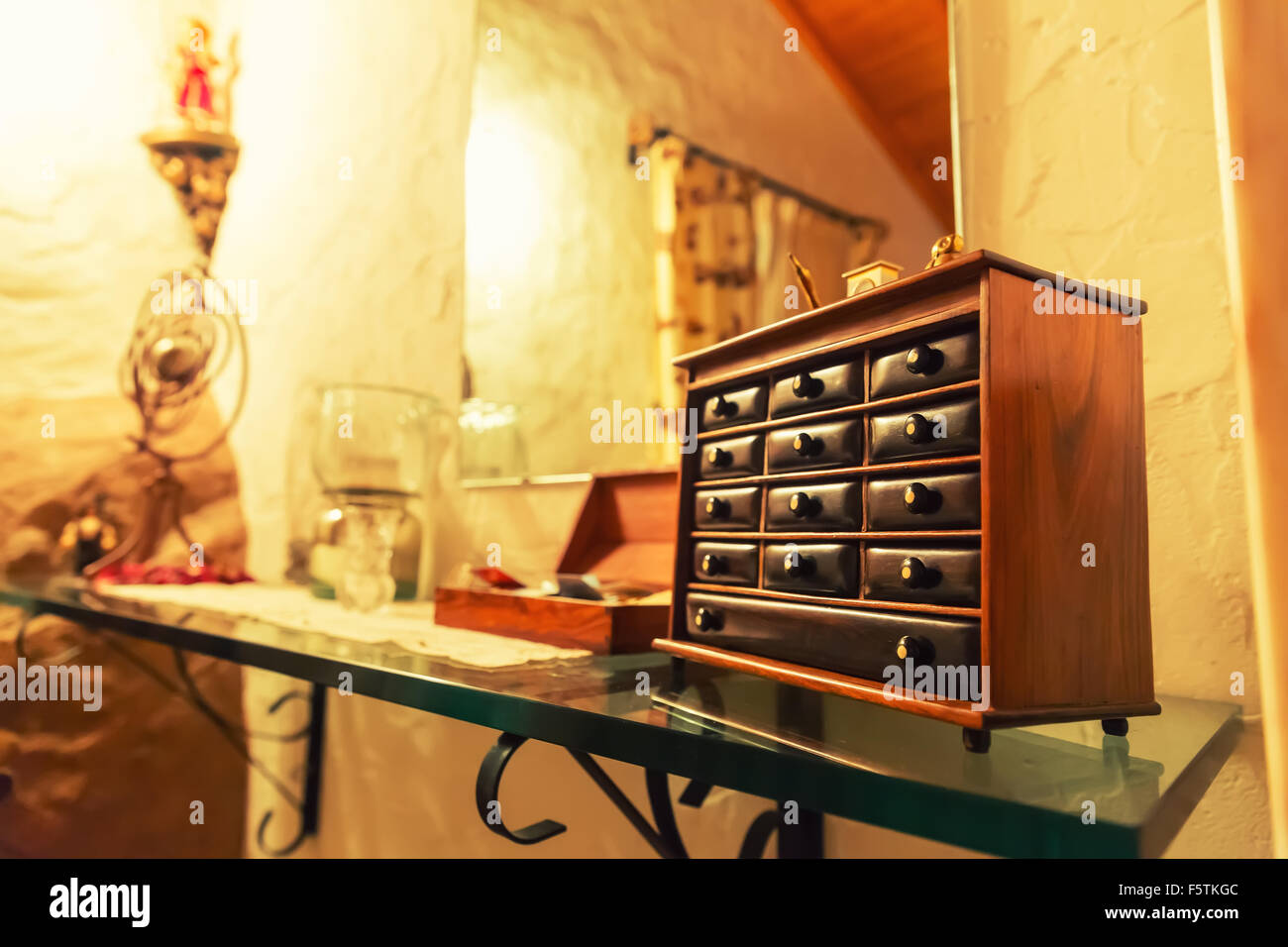 Little decorative luxury table with boxes close up Stock Photo - Alamy